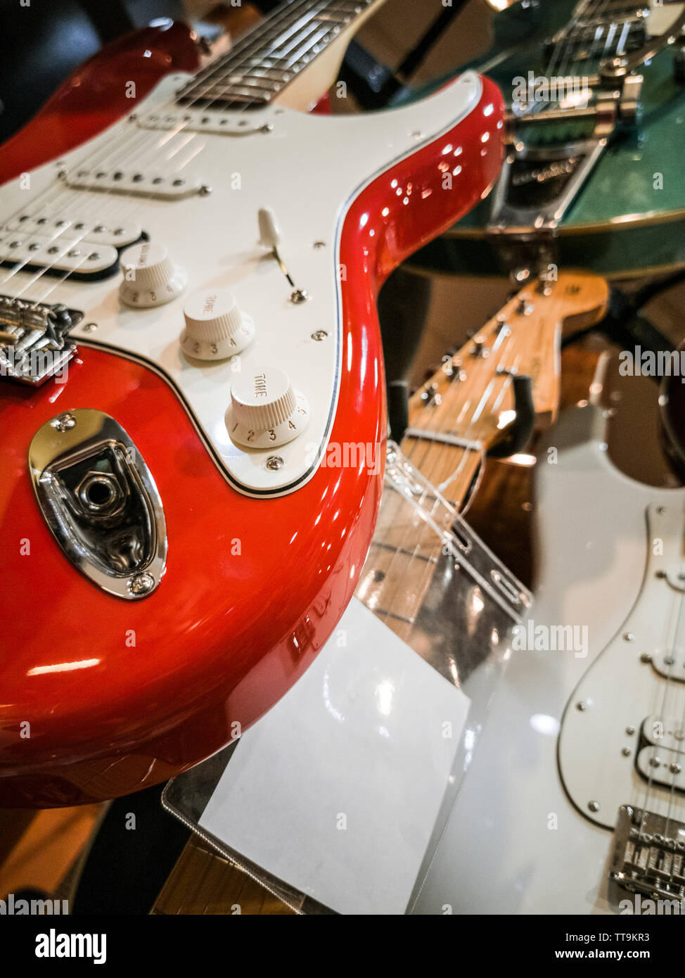red strat at the music store Stock Photo - Alamy