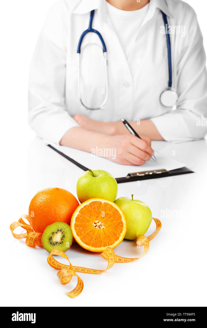 Nutritionist doctor writing diet plan, isolated on white Stock Photo ...