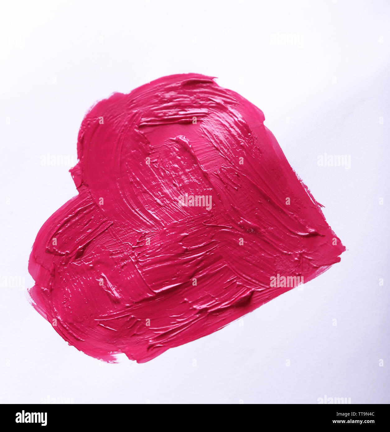 Painted red heart on white paper background Stock Photo - Alamy