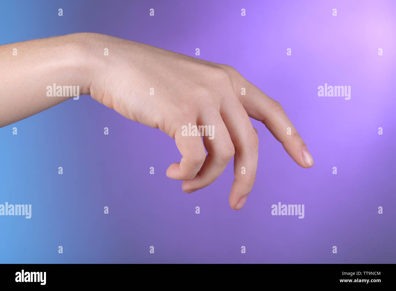Female hand on colorful background Stock Photo - Alamy