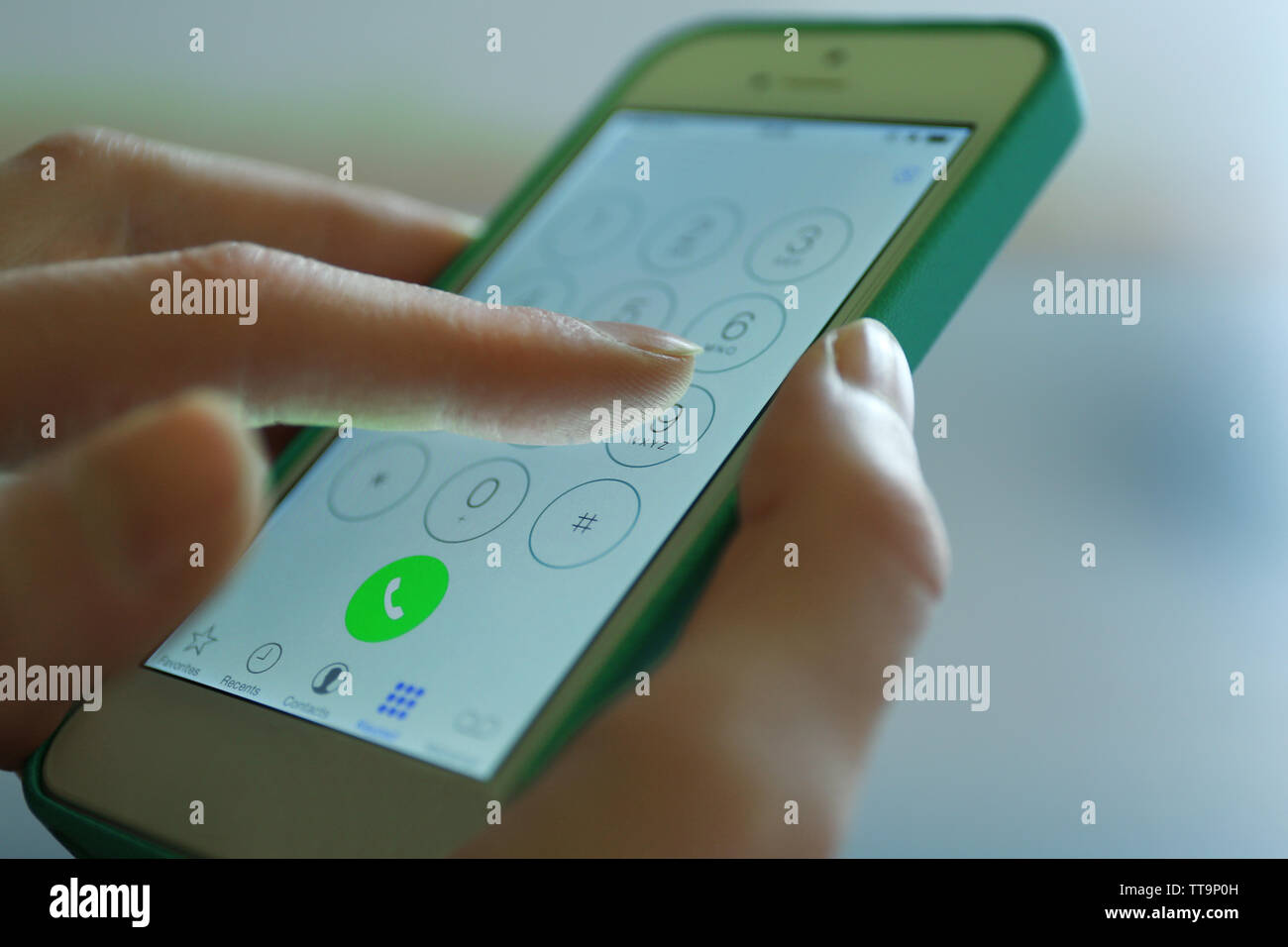 Finger touch number on smartphone to make a call, close up Stock Photo ...