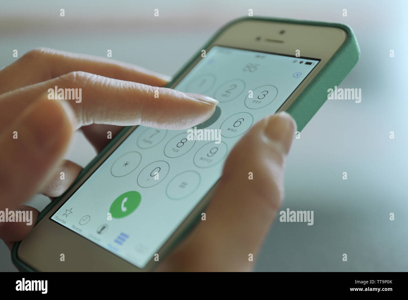 Finger touch number on smartphone to make a call, close up Stock Photo ...