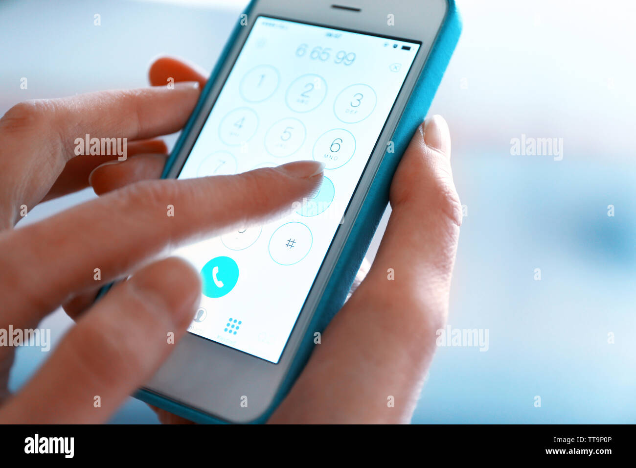 Finger touch number on smartphone to make a call, close up Stock Photo ...