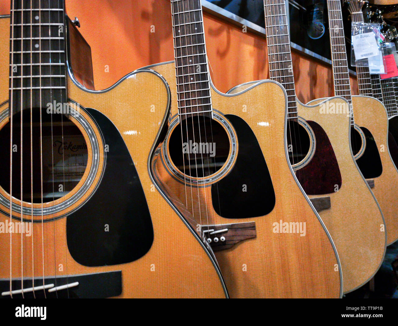 Guitars hanging on walls hi-res stock photography and images - Alamy