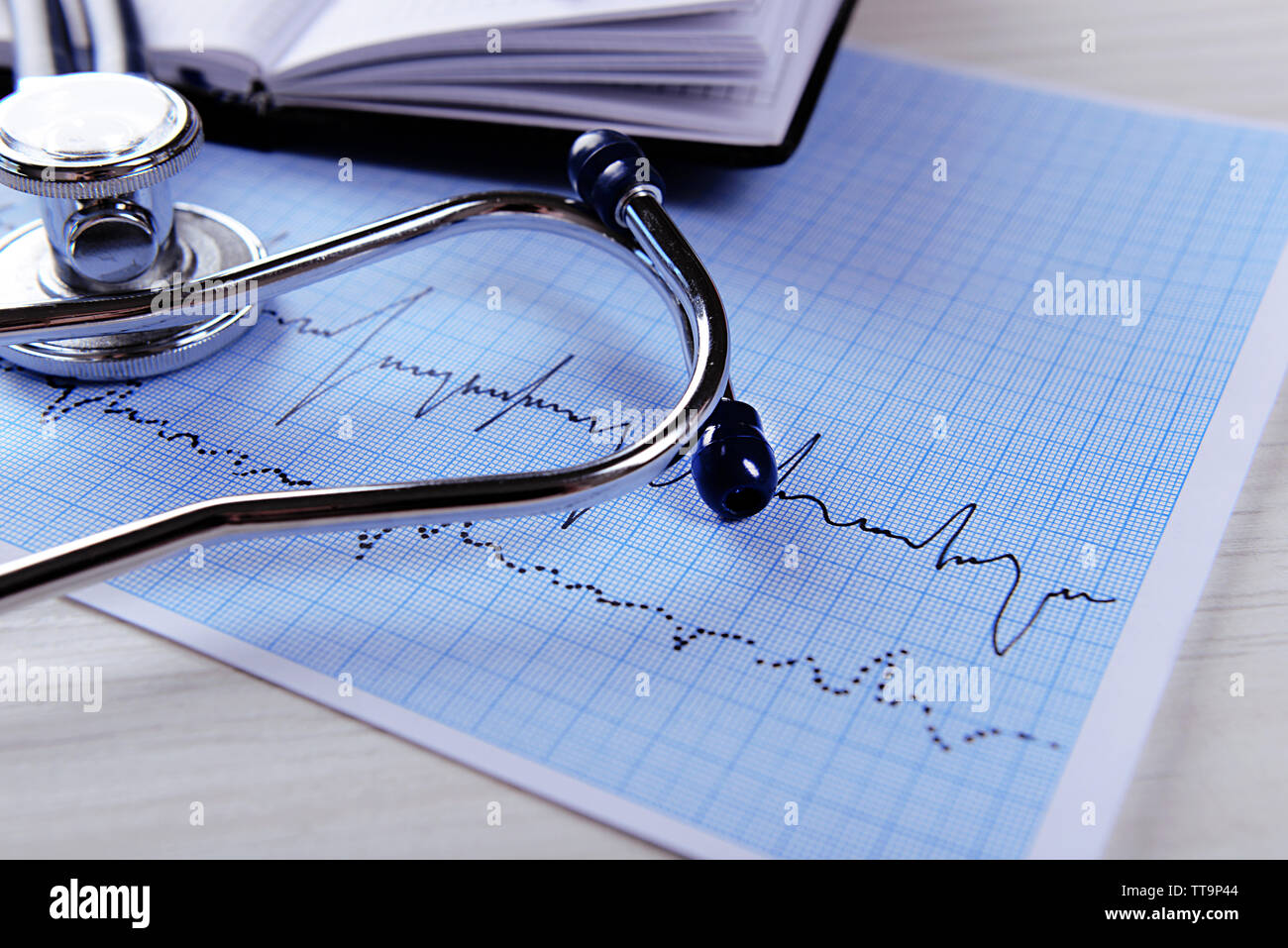 Cardiogram with stethoscope on table, closeup Stock Photo - Alamy