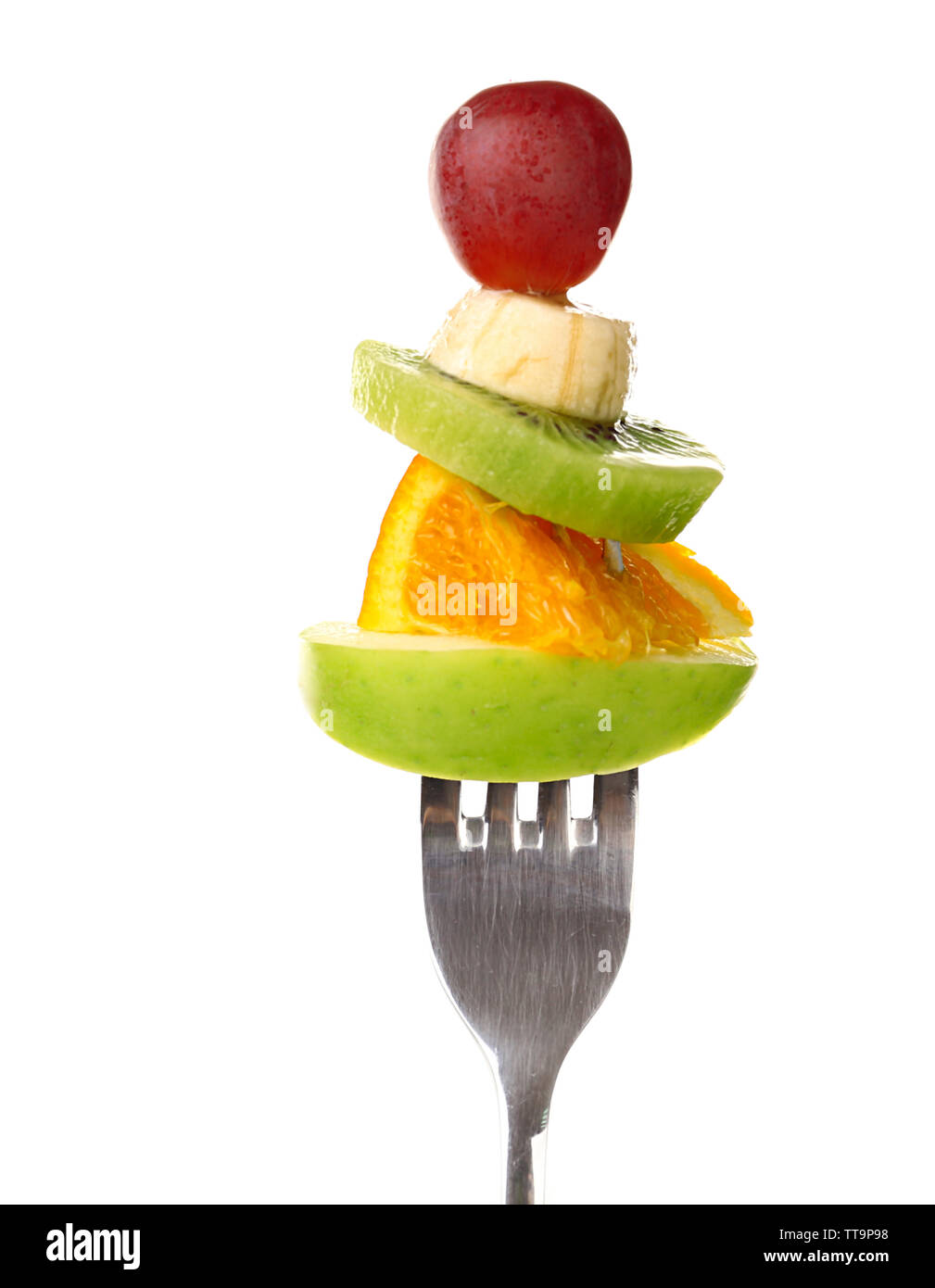 Snack of fruits on fork isolated on white Stock Photo - Alamy