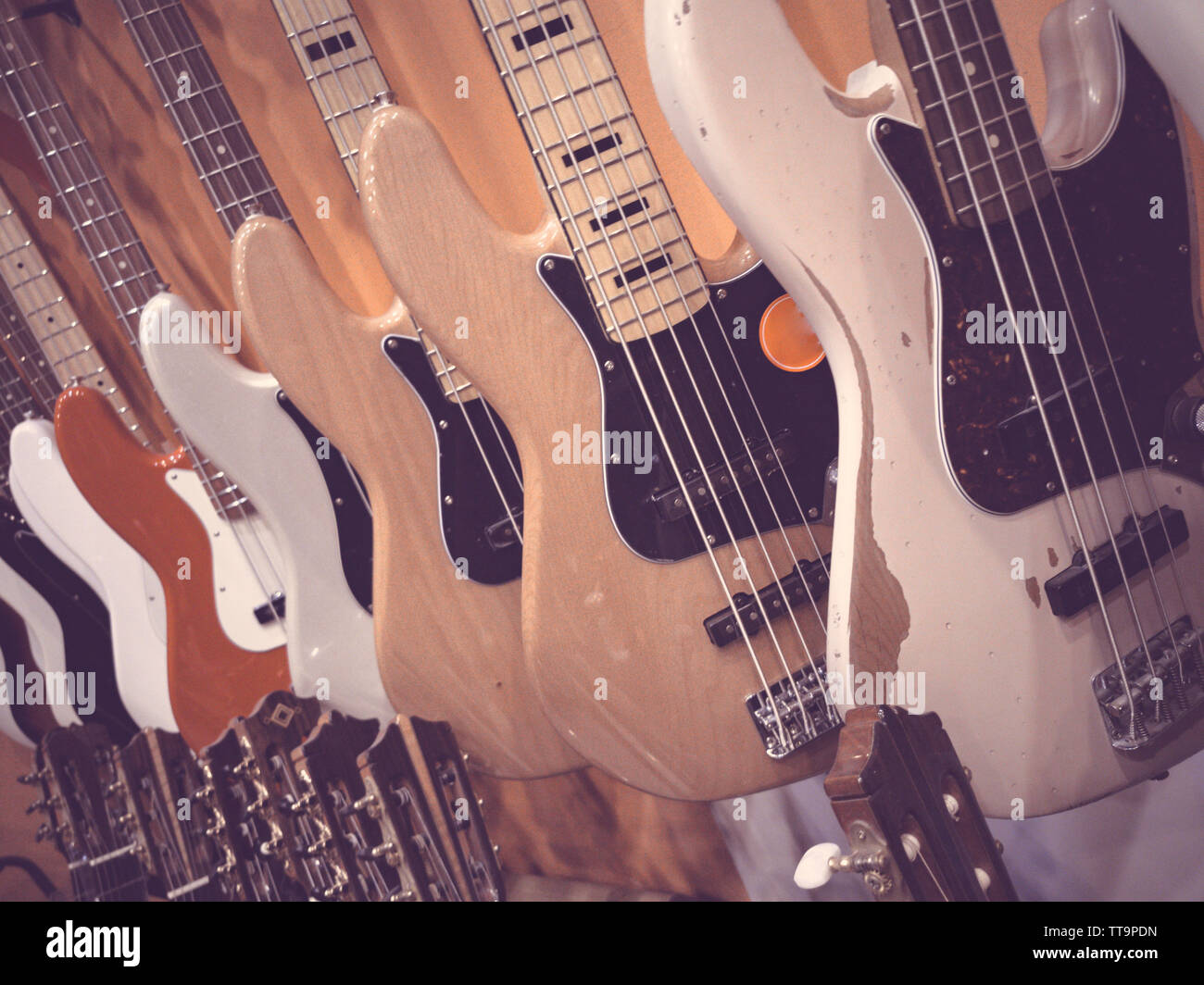 bass guitar music store on sale vintage Stock Photo - Alamy