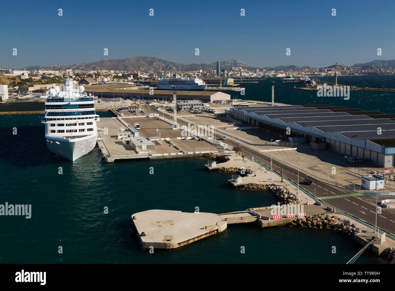 Cruise ship moored at a terminal in the commercial port of Marseilles ...