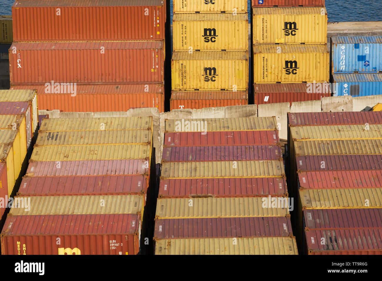 Stacked shipping containers on dock in La Spezia commercial port, La ...