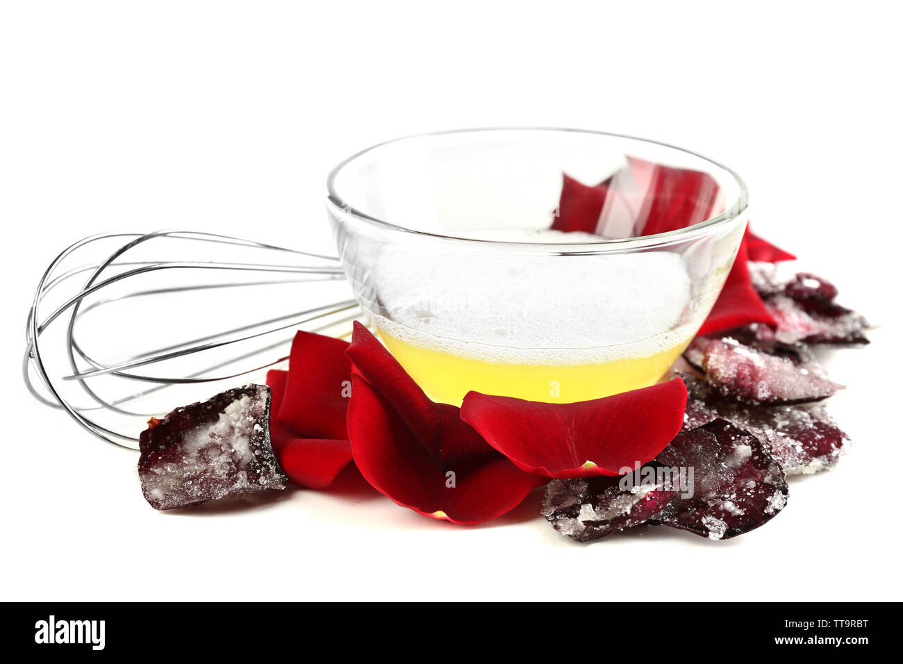 Fresh and candied sugared roses petals and egg whites, isolated on ...