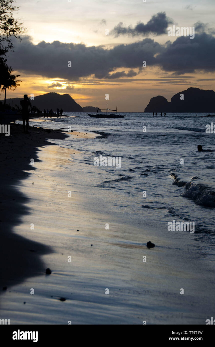 Photo taken at the las cabanas in elnido watching the colors of the ...