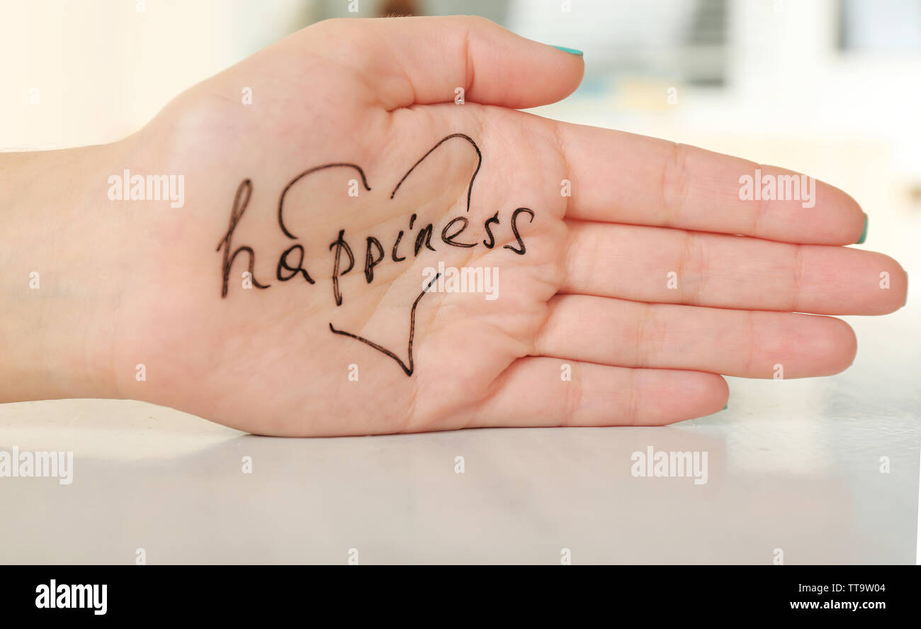 Female hand with written message in room Stock Photo - Alamy
