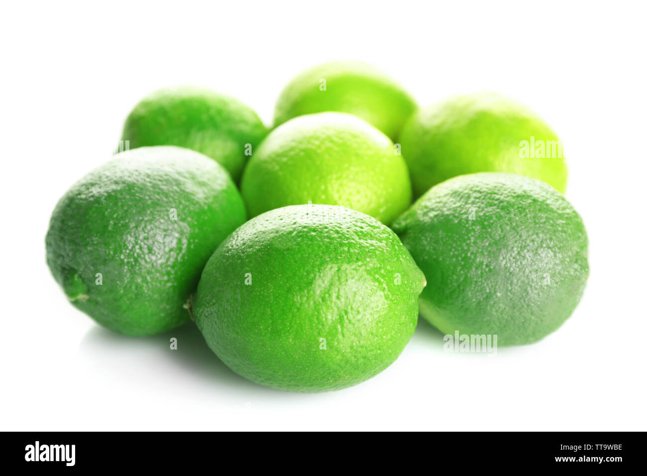 Group of fresh limes isolated on white Stock Photo - Alamy
