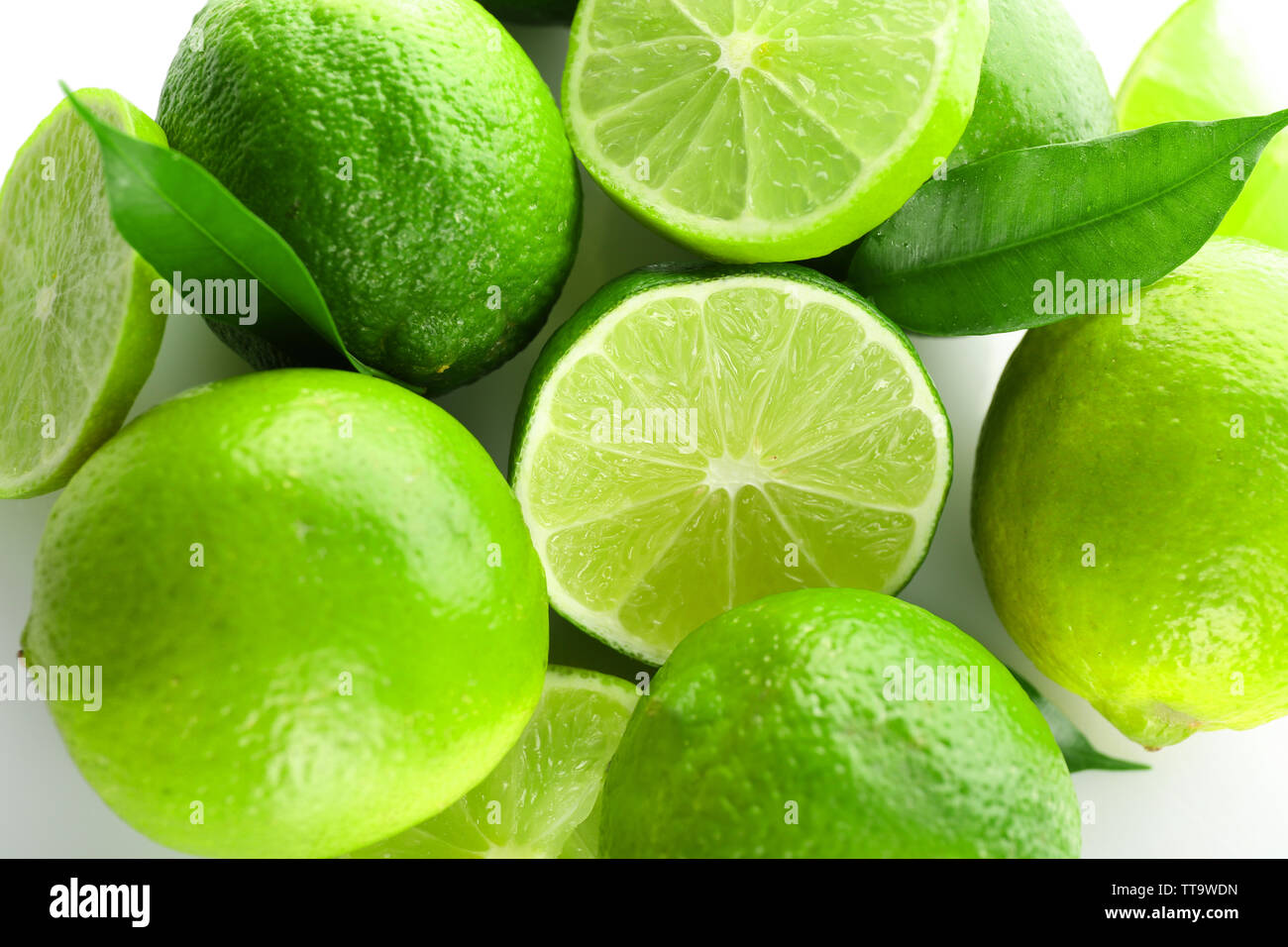 Sliced fresh limes, closeup Stock Photo - Alamy