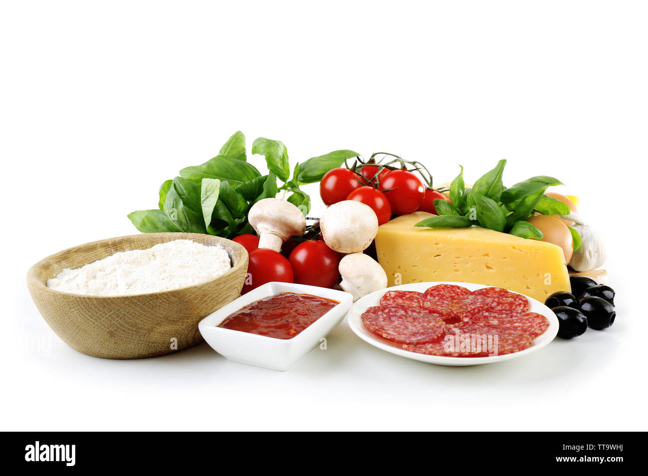 Ingredients for cooking pizza isolated on white Stock Photo - Alamy