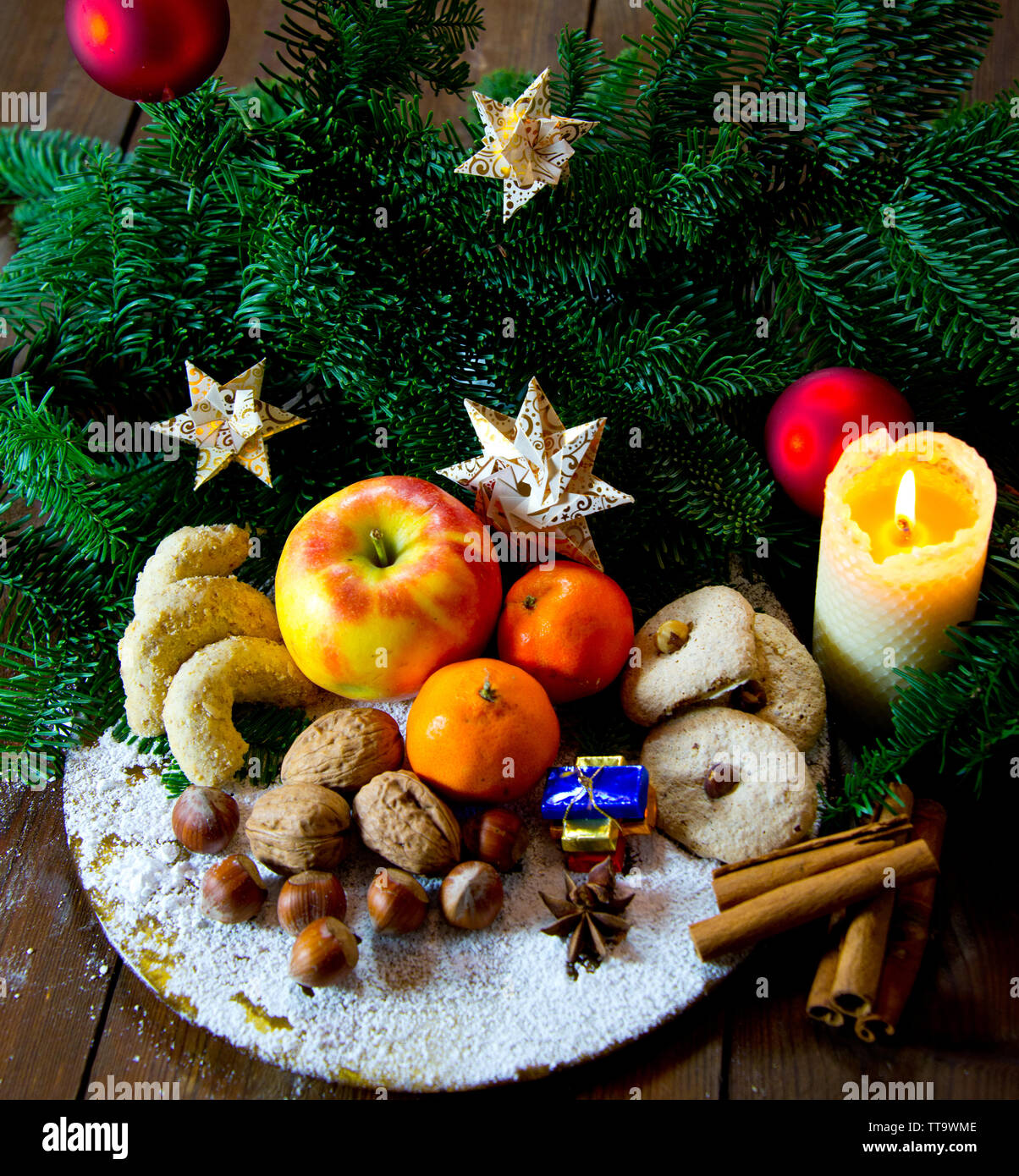 traditional german christmas sweets plate with fruits, nuts aqnd ...
