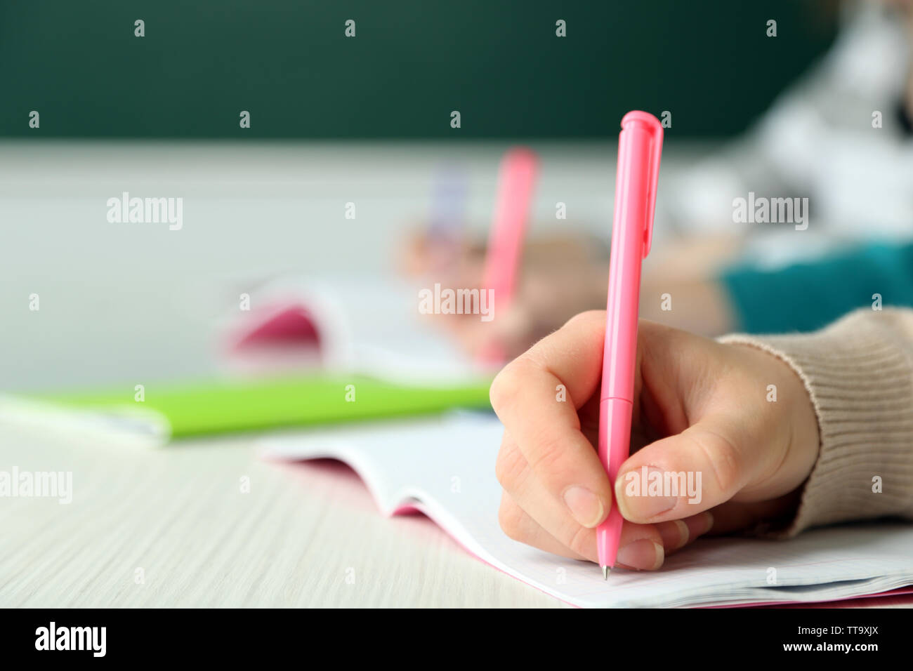 Hands of students at school, close up Stock Photo - Alamy