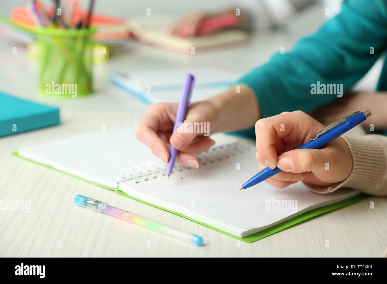Hands of students at school, close up Stock Photo - Alamy