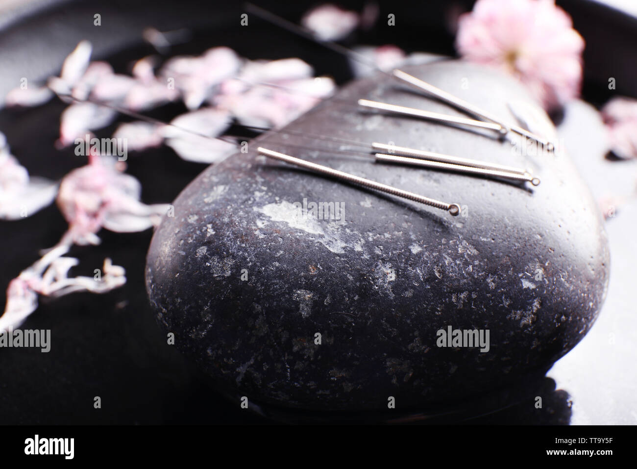 Acupuncture needle stone hi-res stock photography and images - Alamy