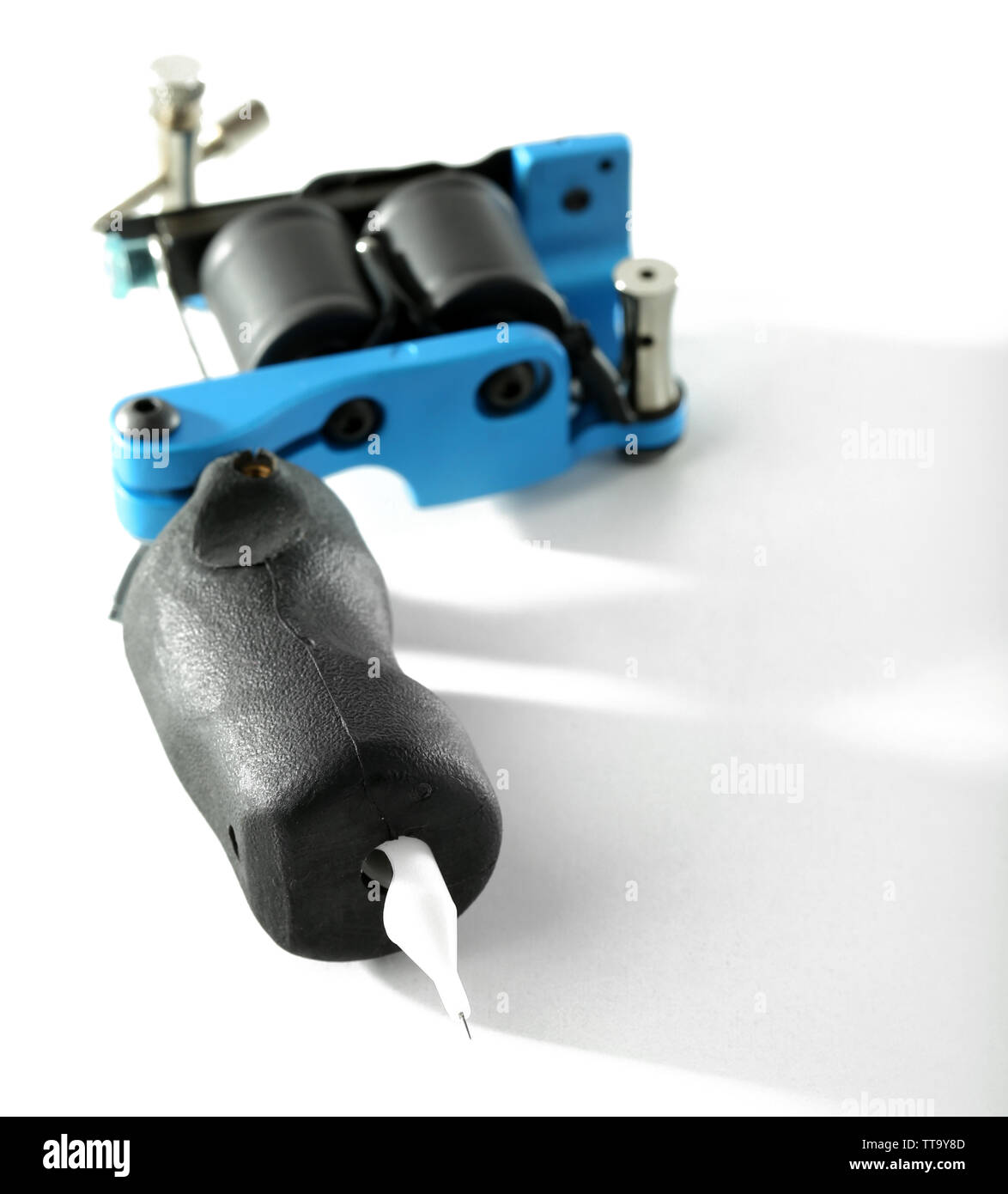 Tattoo machine isolated on white Stock Photo - Alamy