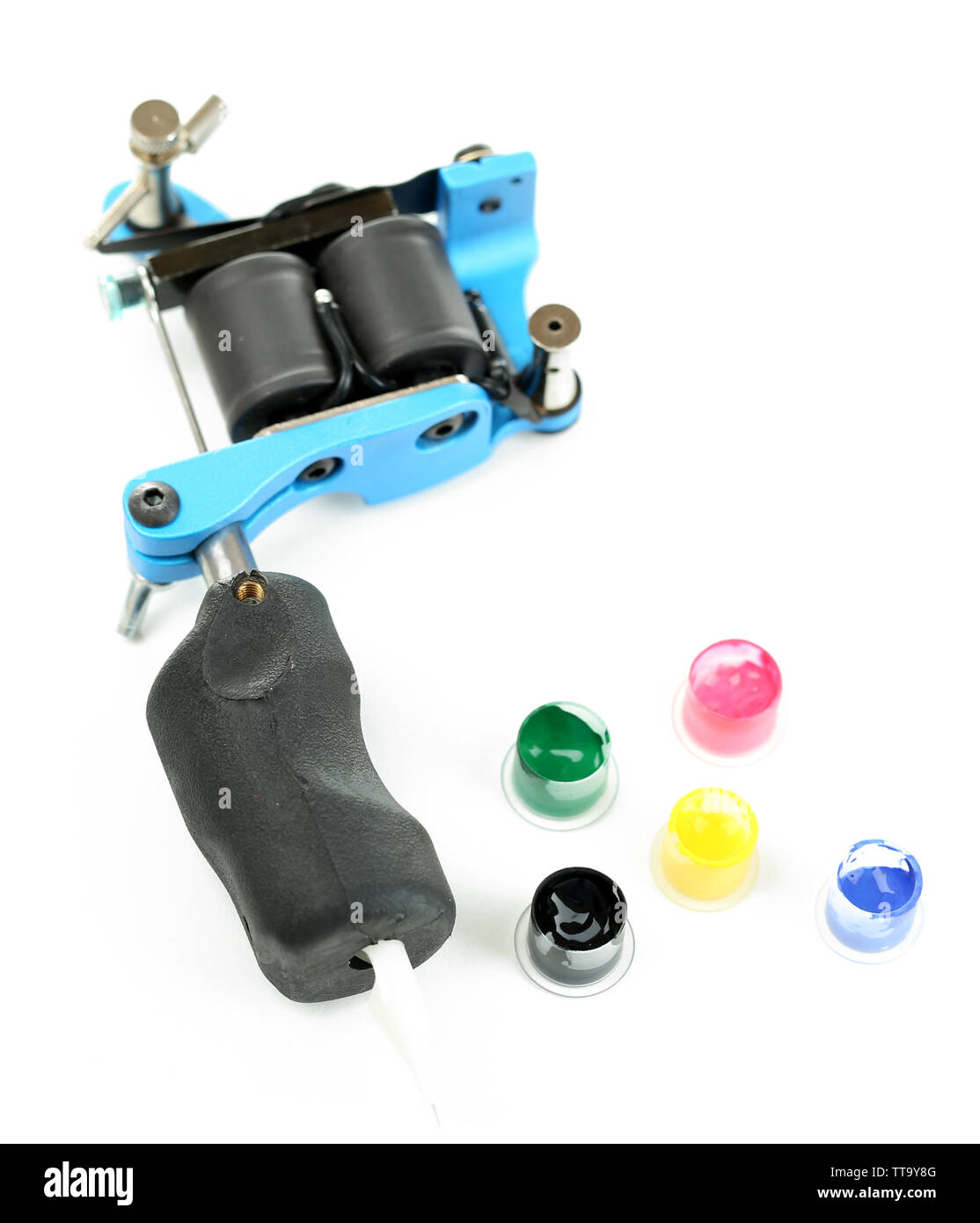 Tattoo machine with colorful ink isolated on white Stock Photo - Alamy