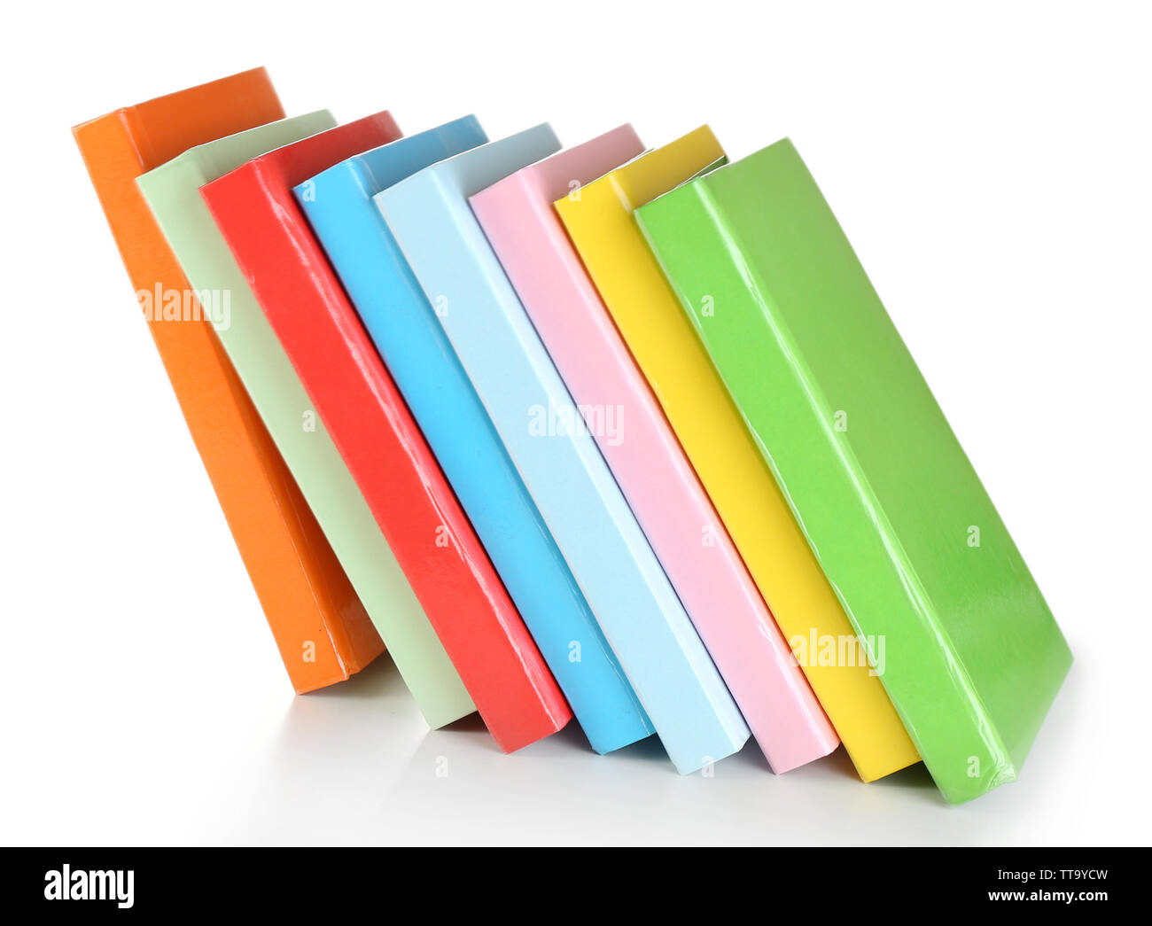 Falling books isolated on white Stock Photo - Alamy