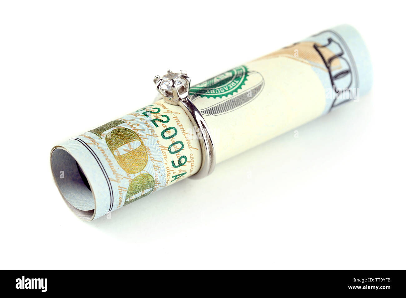 Dollar banknote and wedding ring, isolated on white Stock Photo - Alamy