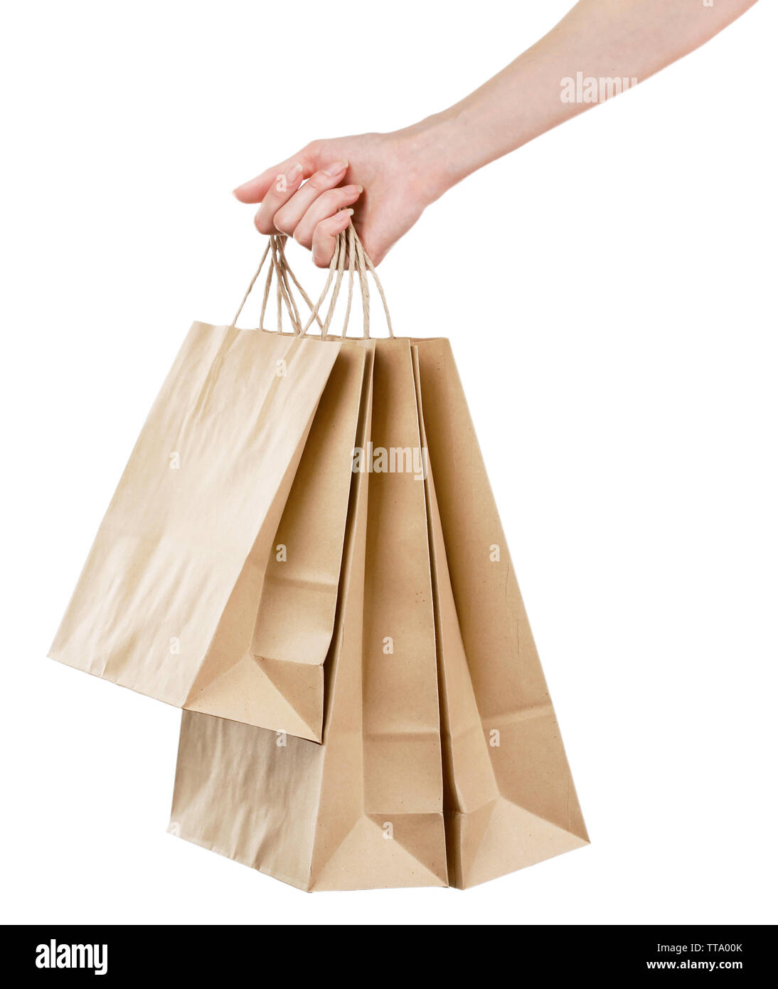 Hand holding brown paper bag Cut Out Stock Images & Pictures - Alamy