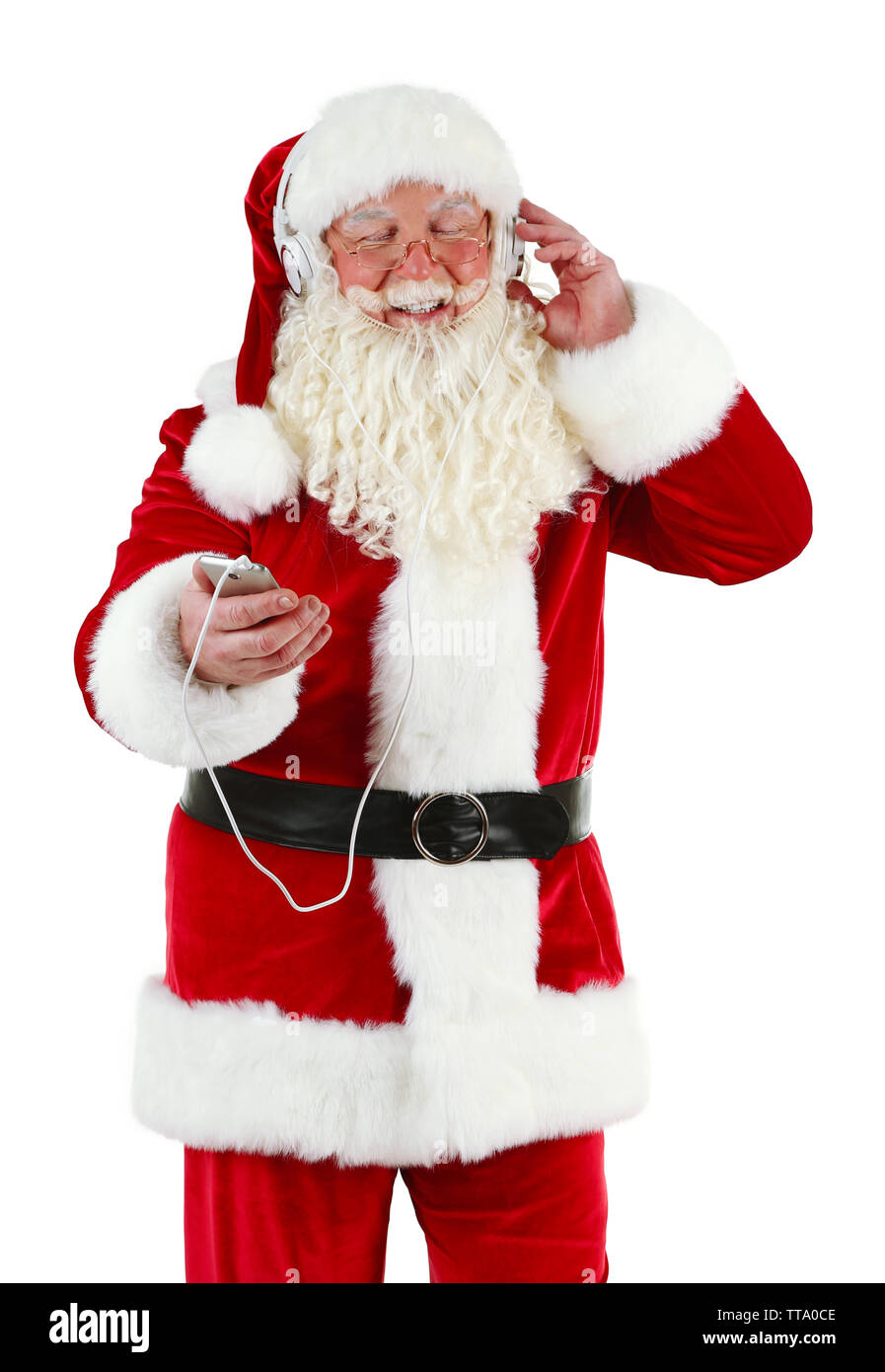 Santa Claus with headphones listening to music, isolated on white ...