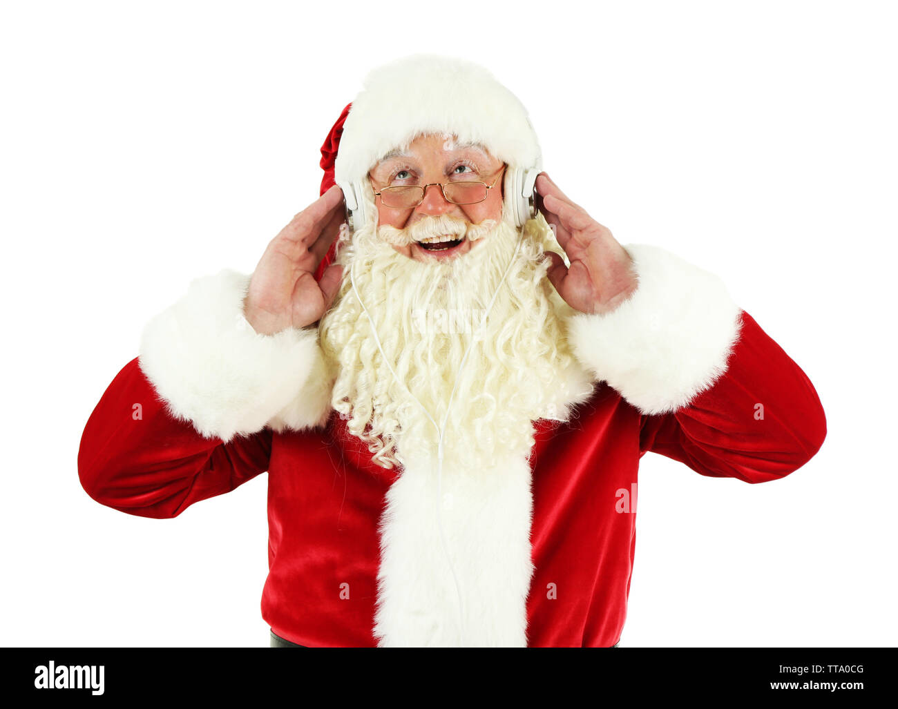 Santa Claus with headphones listening to music, isolated on white ...