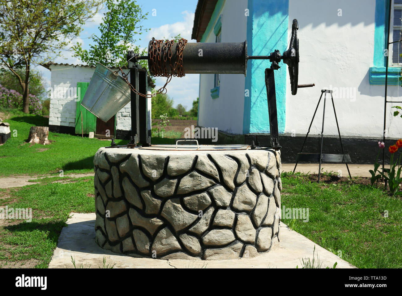 Water well in courtyard Stock Photo - Alamy