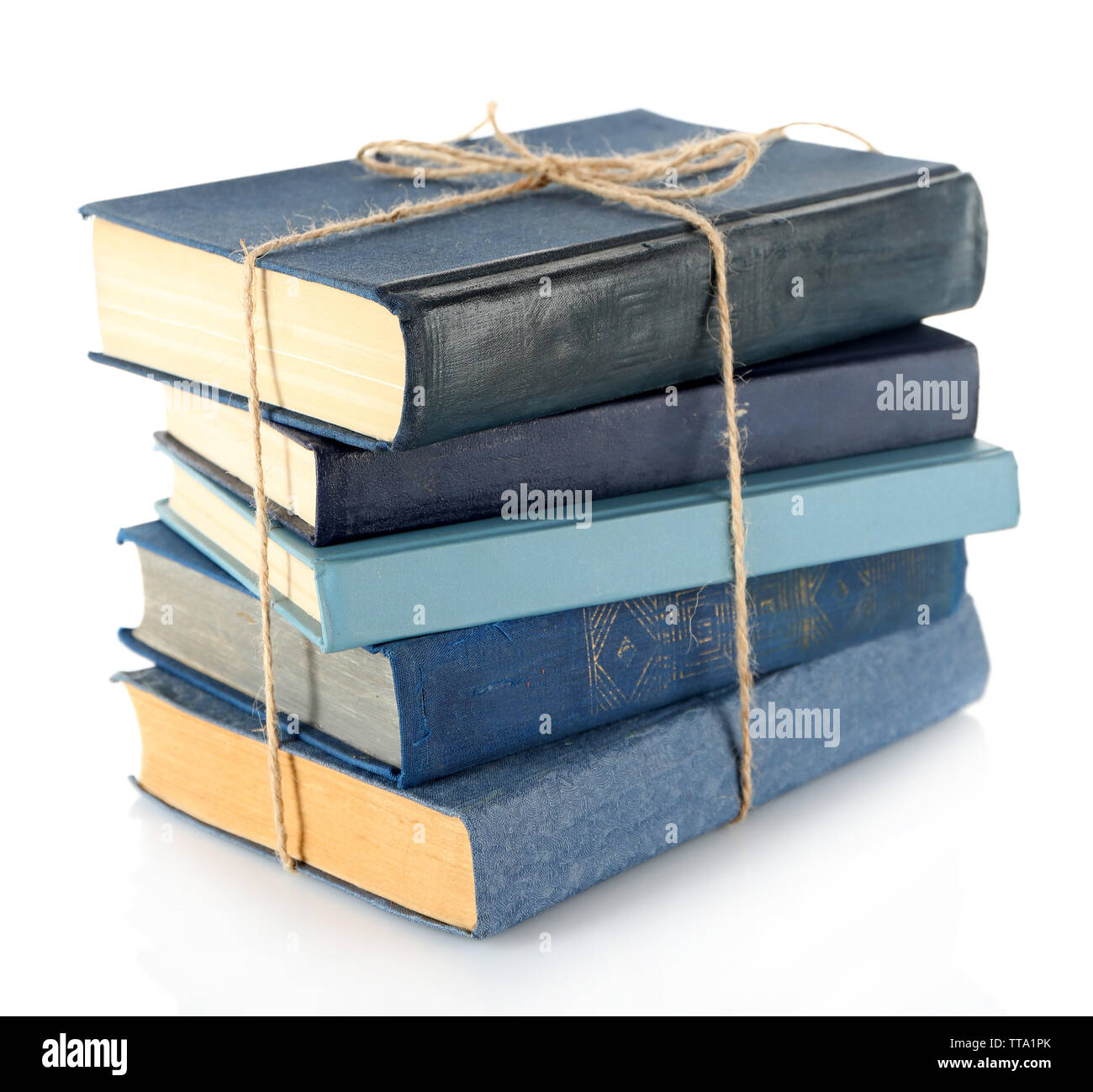 Stack of tied books isolated on white Stock Photo - Alamy
