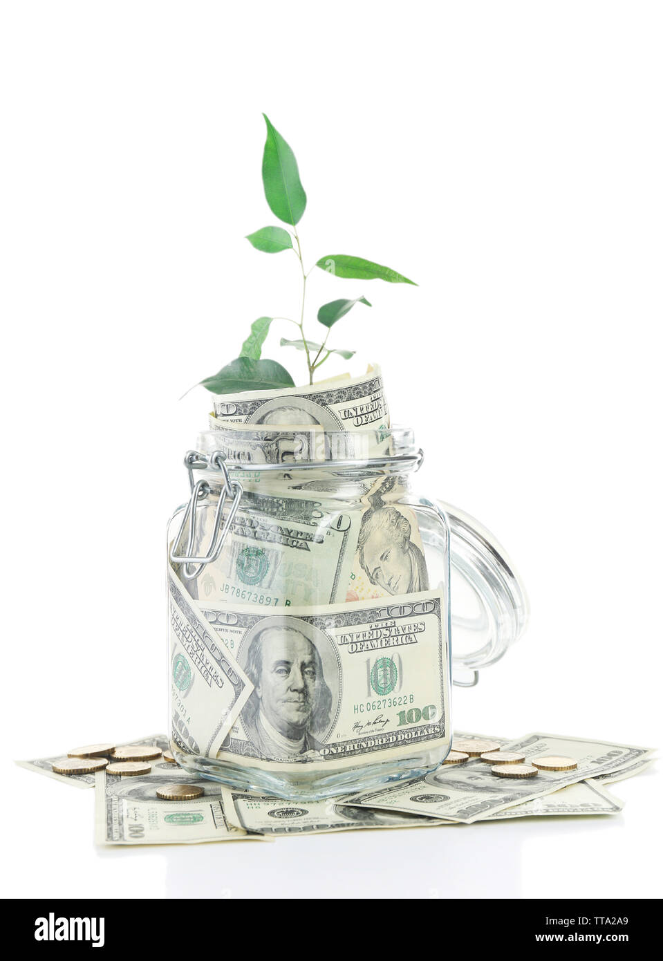 Money in glass jar with plant isolated on white Stock Photo - Alamy