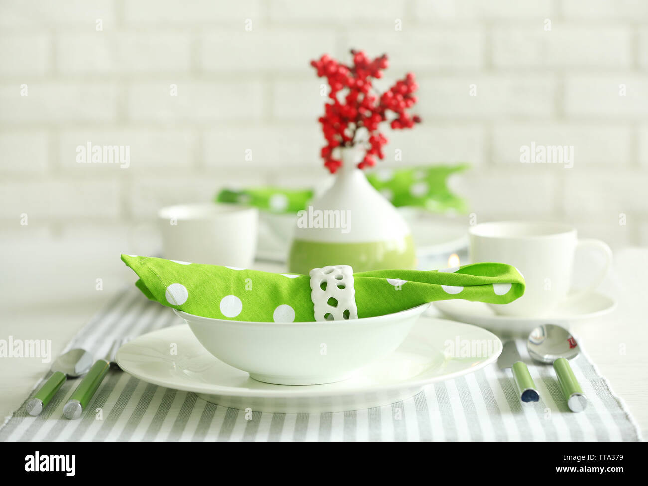 Beautiful holiday table setting in white and green color Stock Photo ...