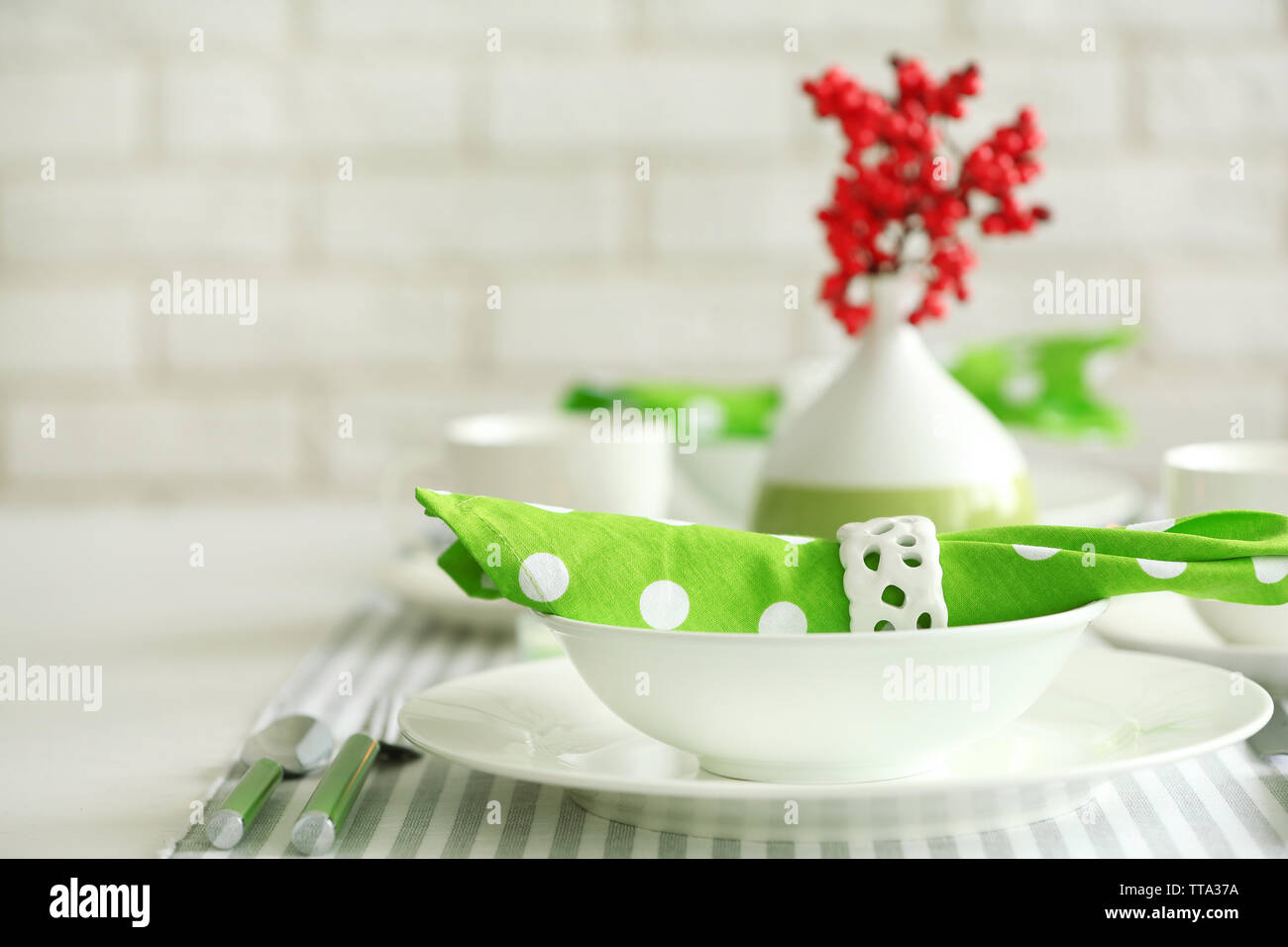 Beautiful holiday table setting in white and green color Stock Photo ...