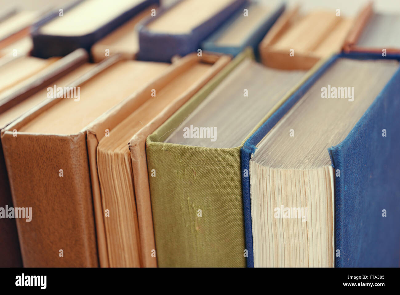 Heap of books close up Stock Photo - Alamy