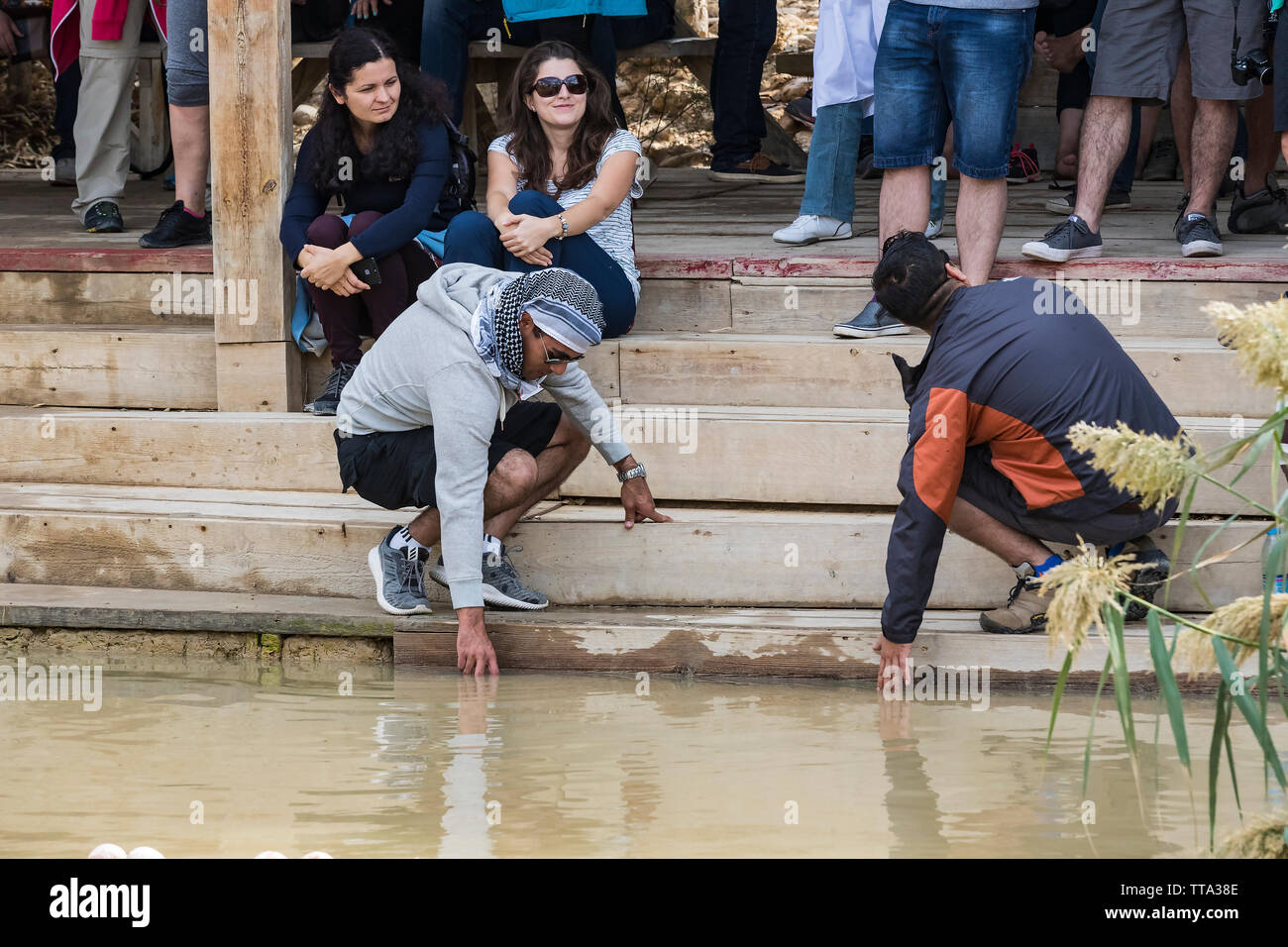 BETHABARA, ISRAEL- 25 NOVEMBER 2017: Pilgrims from different countries ...