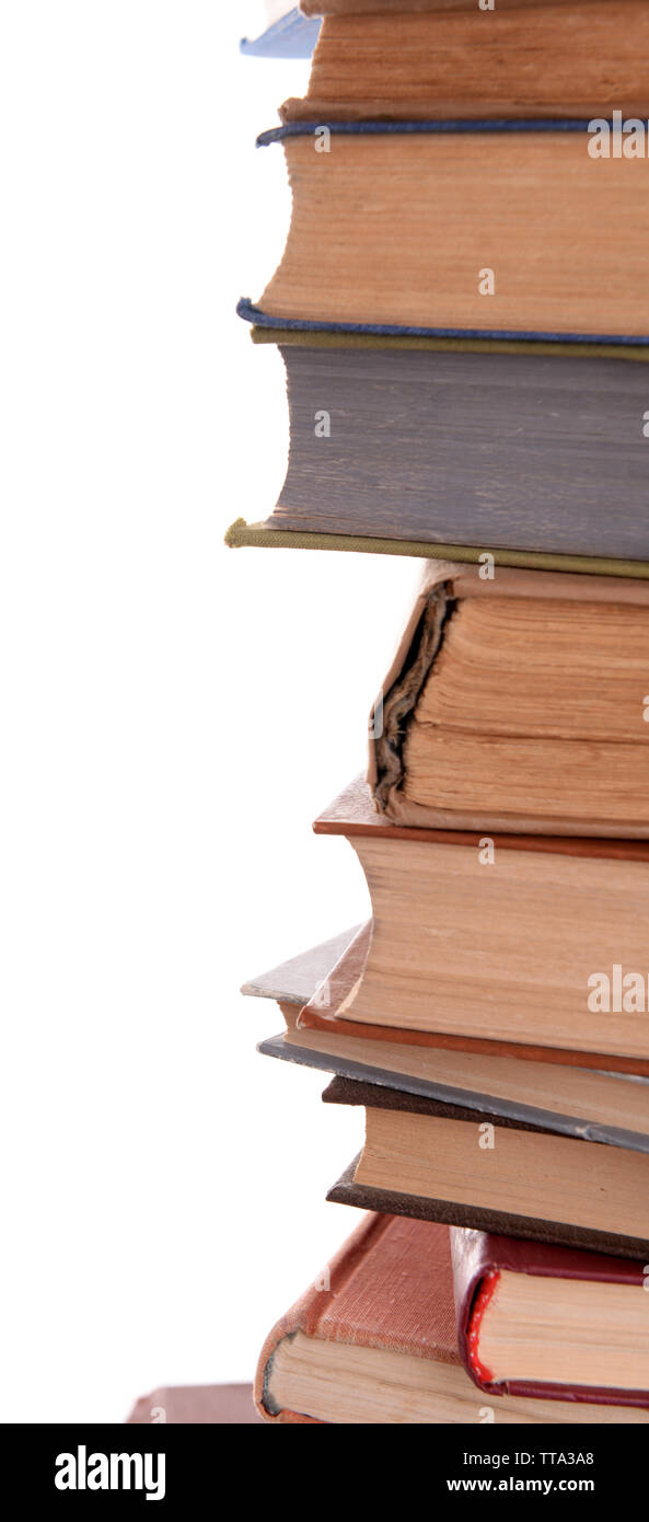 Stack of dusty books on white background hi-res stock photography and ...