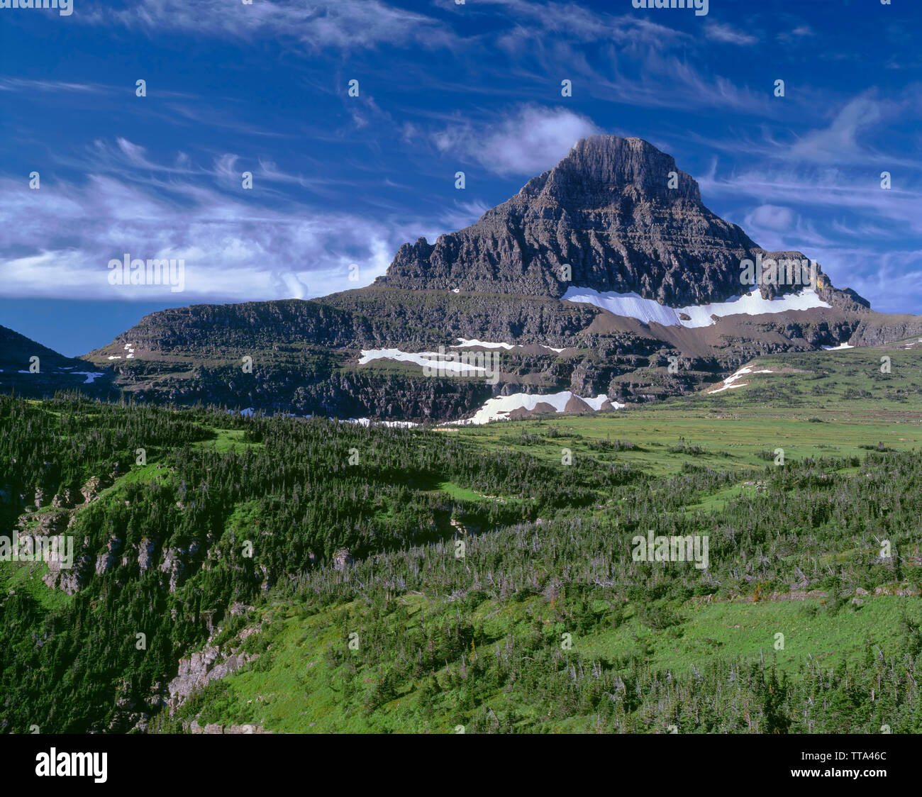 USA, Montana, Glacier National Park, Reynolds Mountain rises above ...