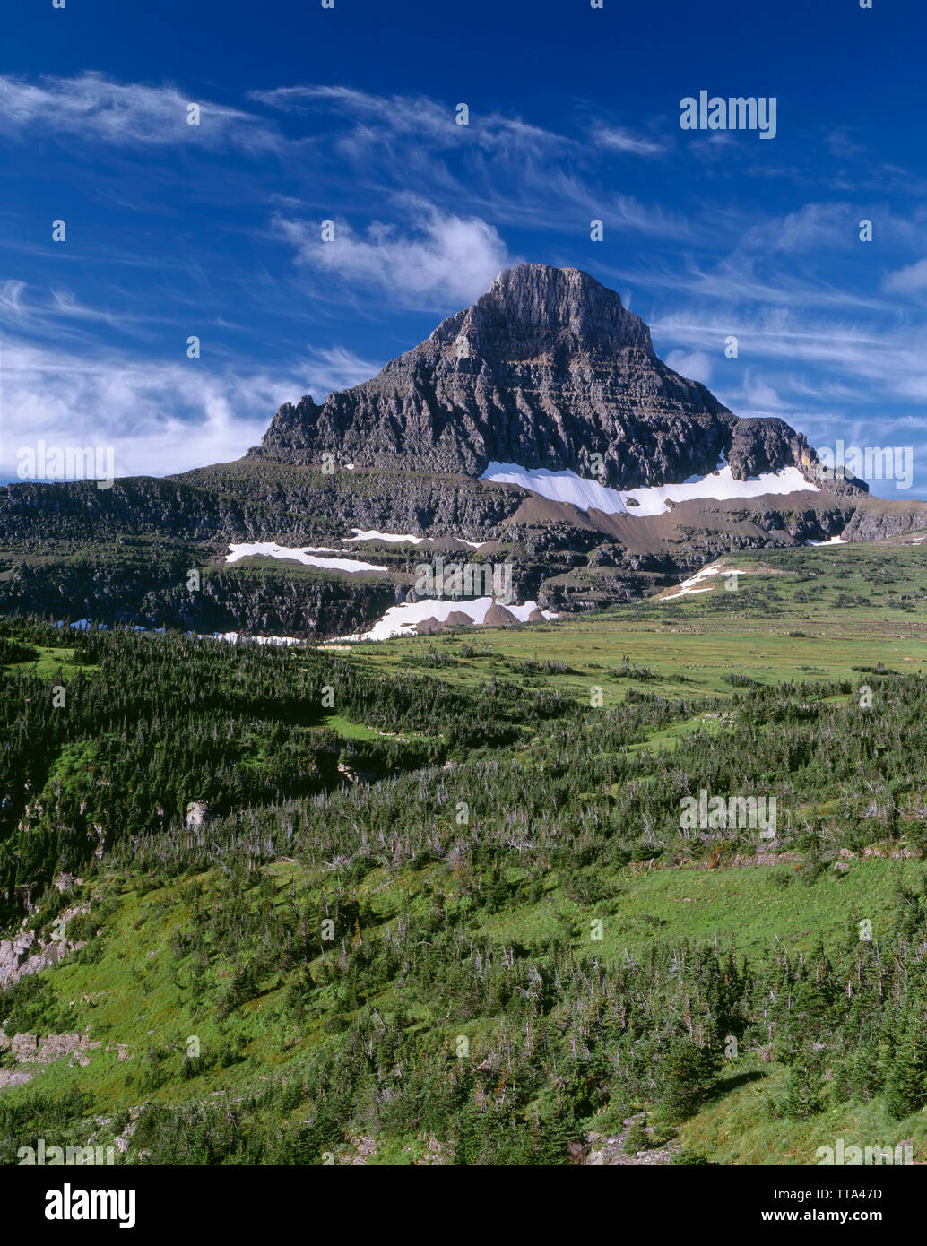 USA, Montana, Glacier National Park, Reynolds Mountain rises above ...