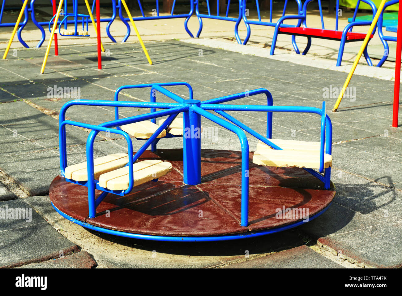 Empty carousel on playground Stock Photo - Alamy