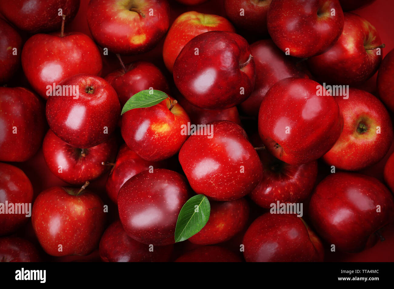 Red apples background Stock Photo - Alamy
