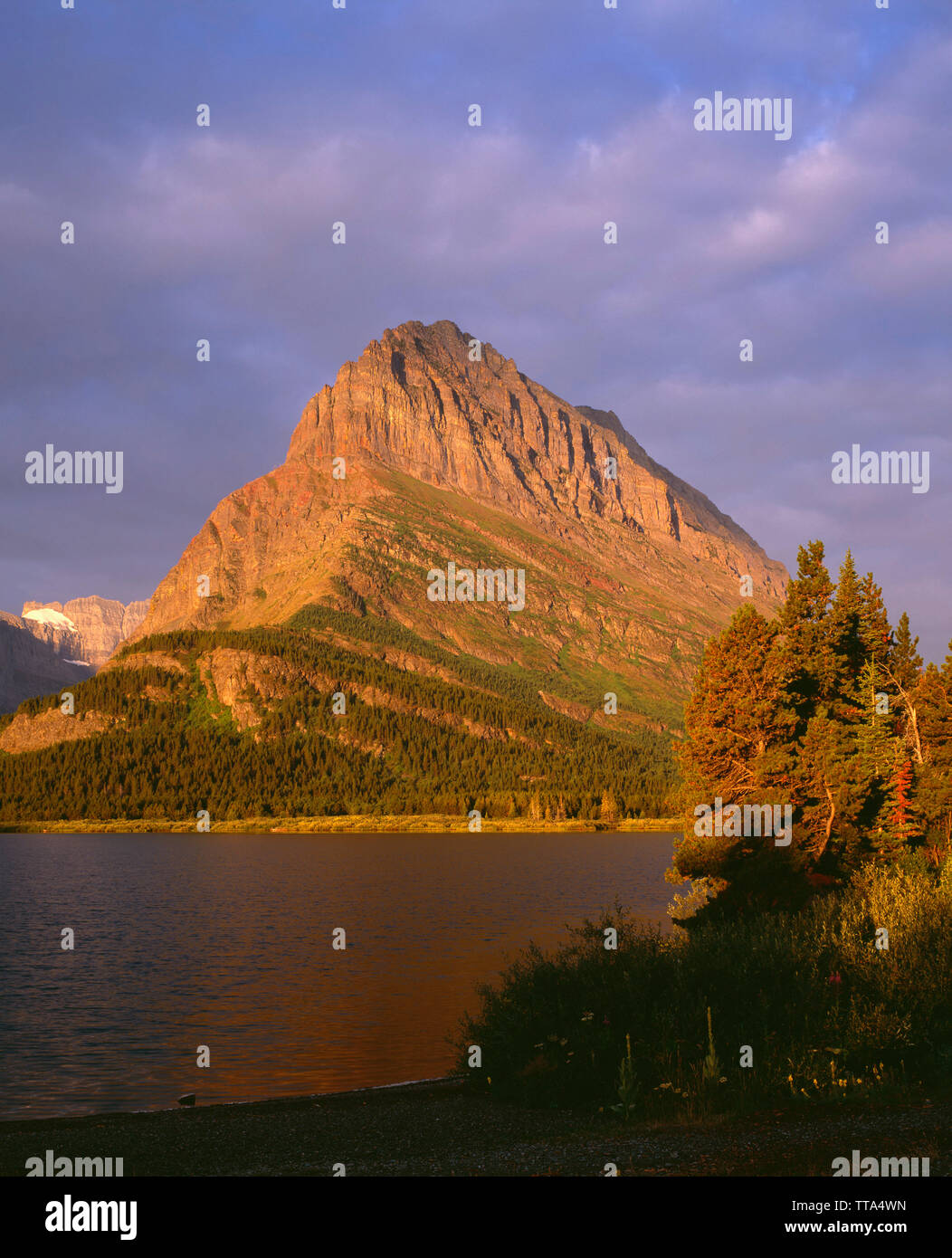 USA, Montana, Glacier National Park, Sunrise light brightens Grinnell ...