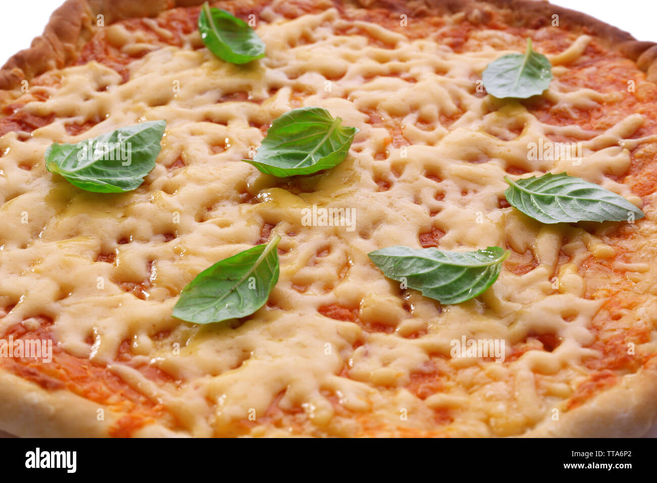 Cheese pizza with basil close up Stock Photo - Alamy