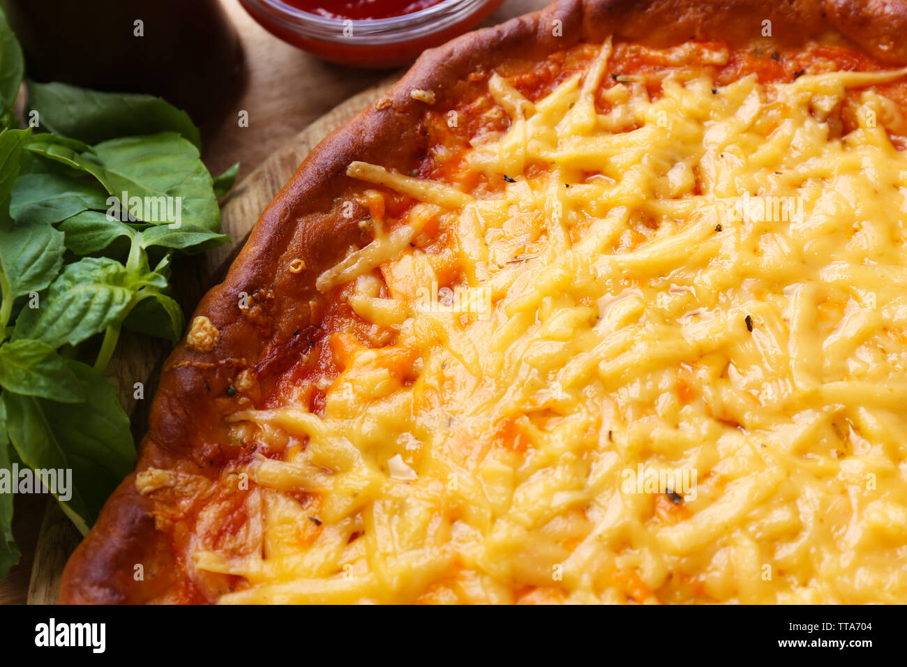 Tasty cheese pizza on table close up Stock Photo - Alamy