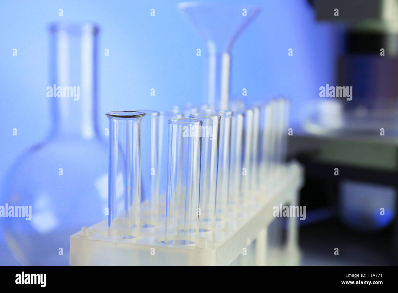 Test tubes and microscope in laboratory Stock Photo - Alamy