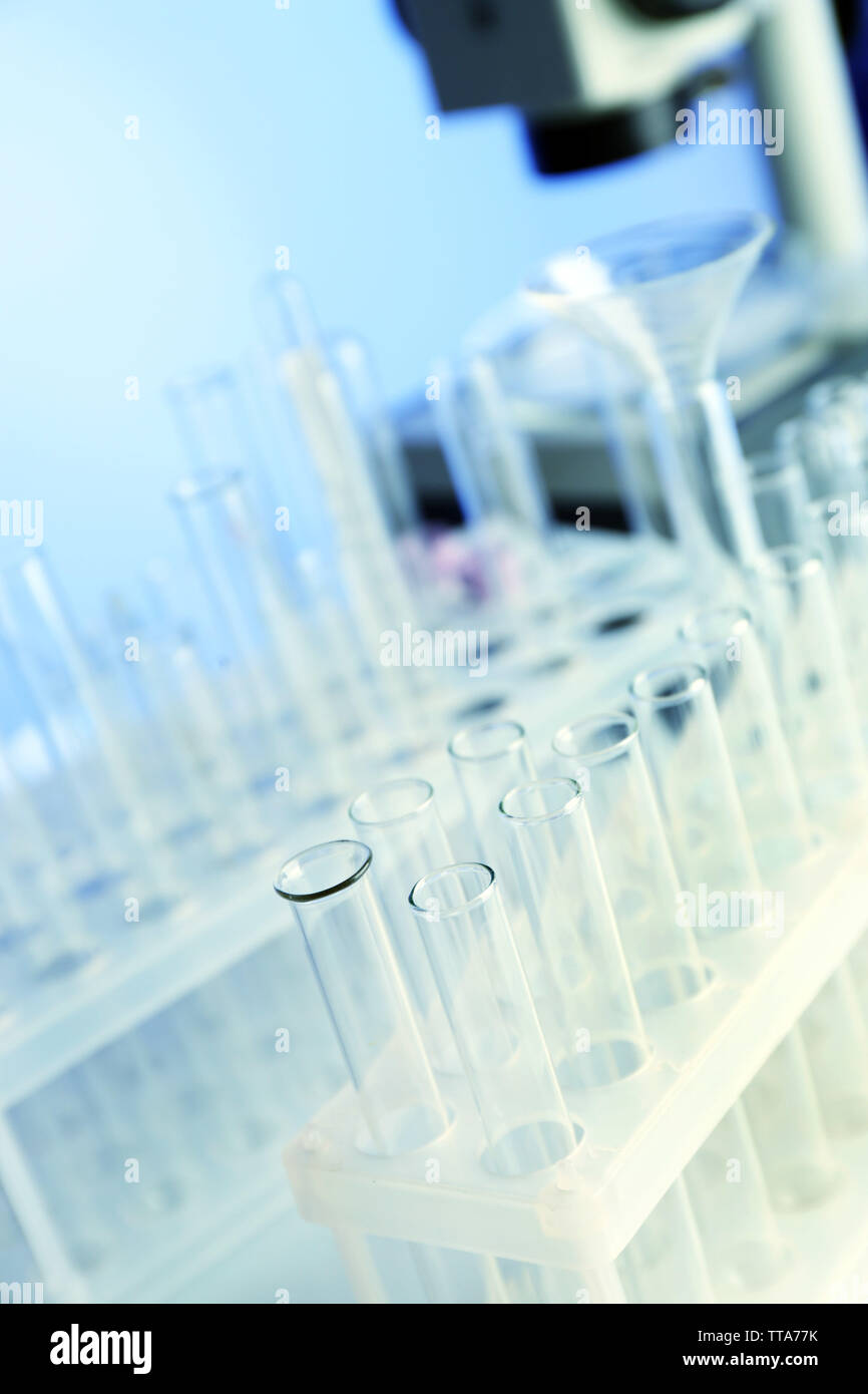 Test tubes and microscope in laboratory Stock Photo - Alamy