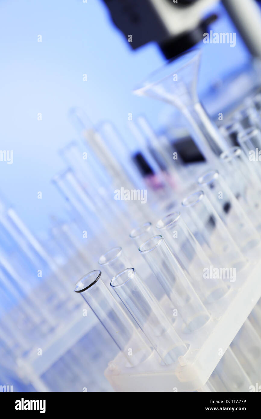 Test tubes and microscope in laboratory Stock Photo - Alamy