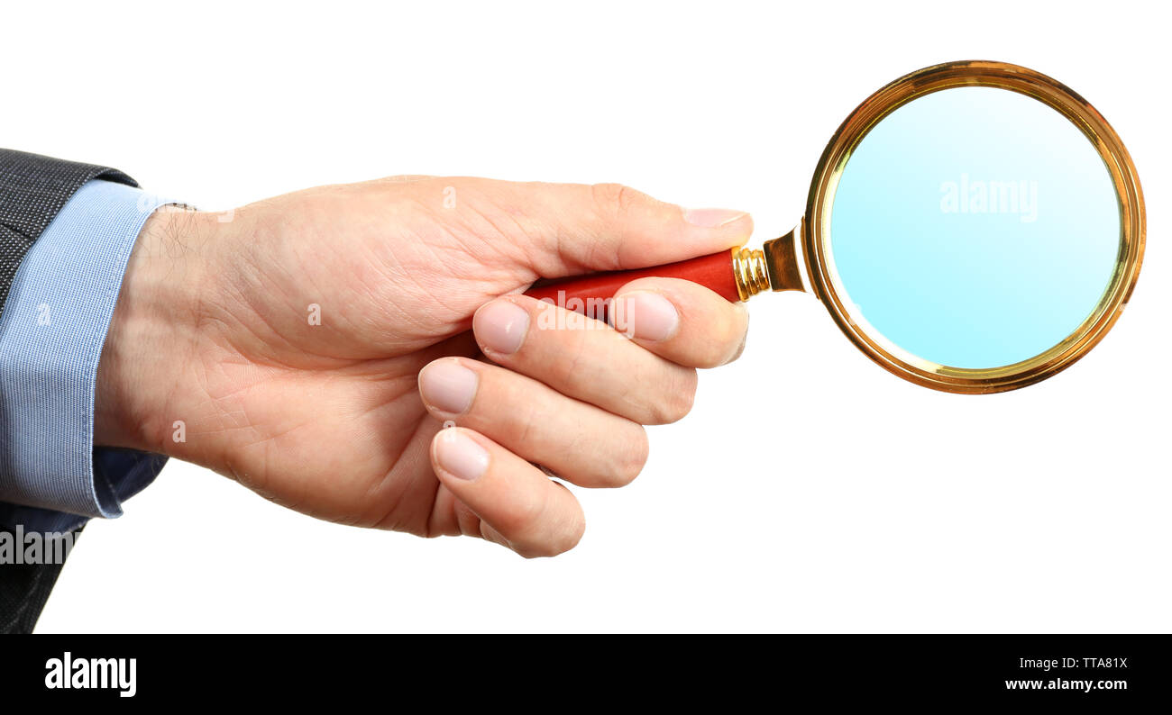 Male hand holding magnifying glass isolated on white Stock Photo - Alamy