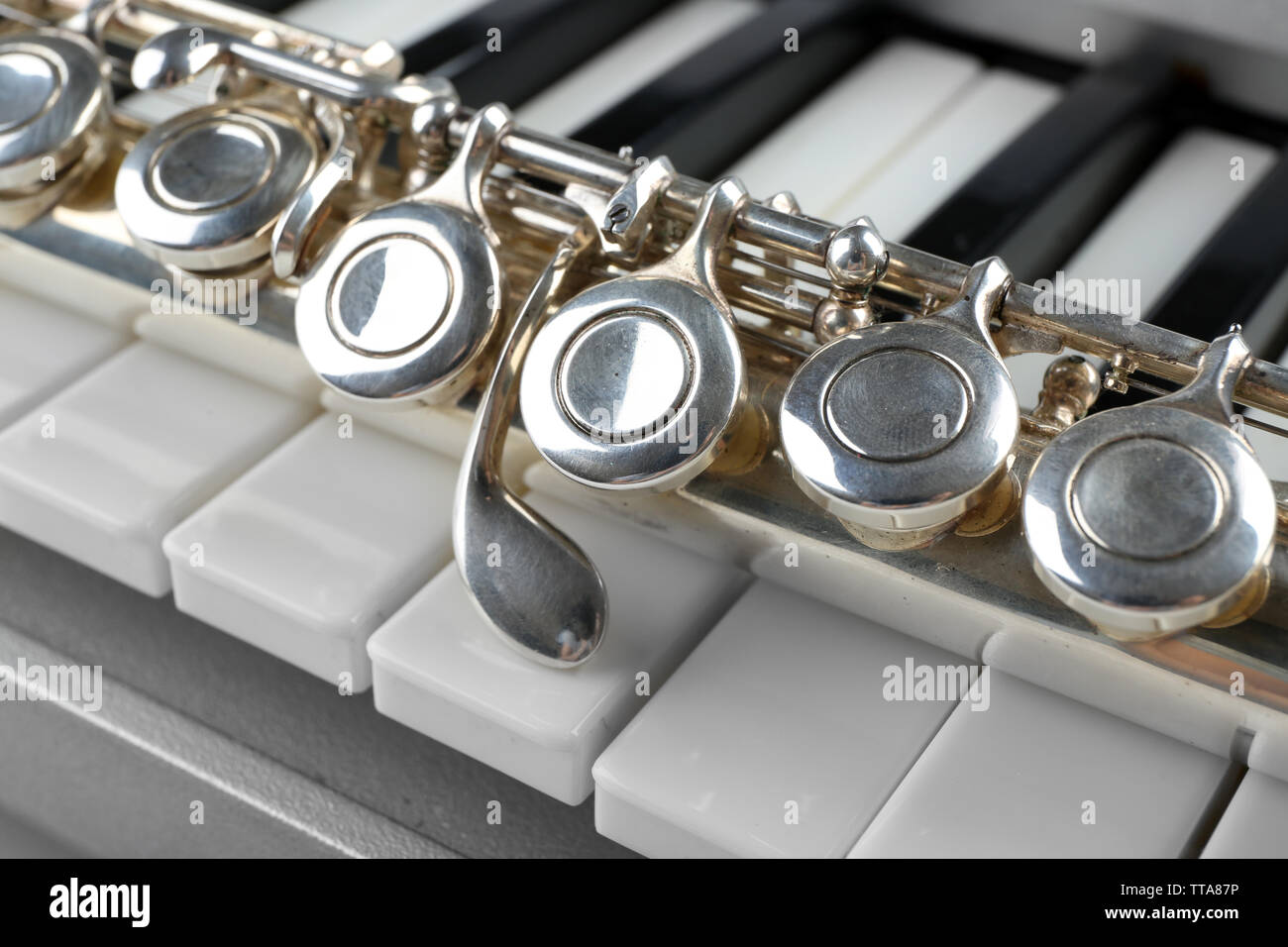Flute and piano close up Stock Photo - Alamy